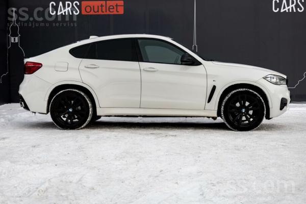 White BMW X6 2015 in Riga, with an engine capacity of 3.00 L and mileage of 190 thousand km for 24990 €, photo 4 on AUTOMOTO.COM.LV