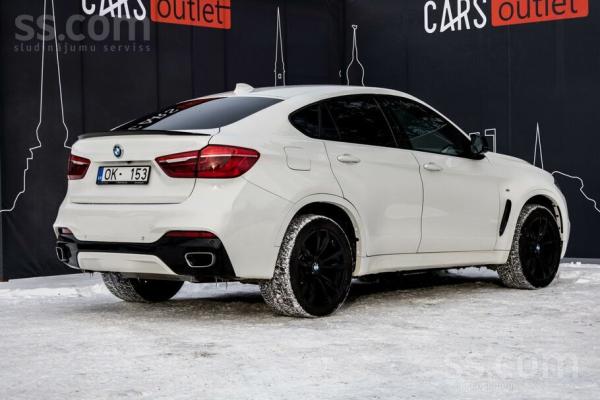White BMW X6 2015 in Riga, with an engine capacity of 3.00 L and mileage of 190 thousand km for 24990 €, photo 6 on AUTOMOTO.COM.LV