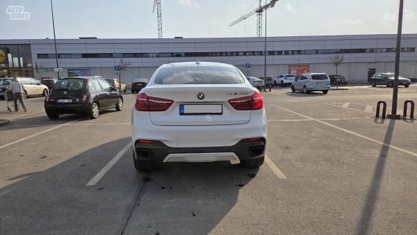 White BMW X6 2015 in Vilnius, with an engine capacity of 3.00 L and mileage of 205 thousand km for 25500 €, photo 6 on AUTOMOTO.COM.LV