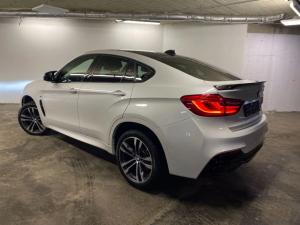 White BMW X6 2015 in Riga, with an engine capacity of 3.00 L and mileage of 199 thousand km for 29950 €, photo 3 on AUTOMOTO.COM.LV