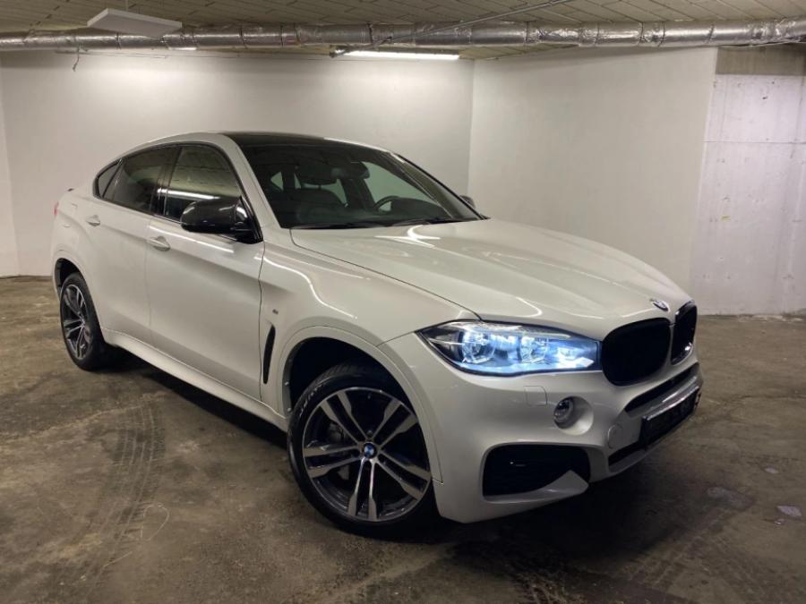 White BMW X6 2015 in Riga, with an engine capacity of 3.00 L and mileage of 199 thousand km for 29950 €, photo 4 on AUTOMOTO.COM.LV