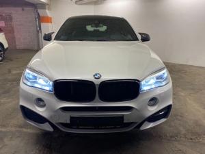 White BMW X6 2015 in Riga, with an engine capacity of 3.00 L and mileage of 199 thousand km for 29950 €, photo 6 on AUTOMOTO.COM.LV