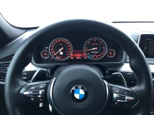 White BMW X6 2015 in Riga, with an engine capacity of 3.00 L and mileage of 199 thousand km for 29950 €, photo 12 on AUTOMOTO.COM.LV
