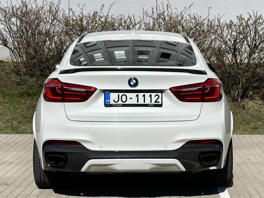 White BMW X6 2015 in Riga, with an engine capacity of 3.00 L and mileage of 185 thousand km for 24900 €, photo 7 on AUTOMOTO.COM.LV