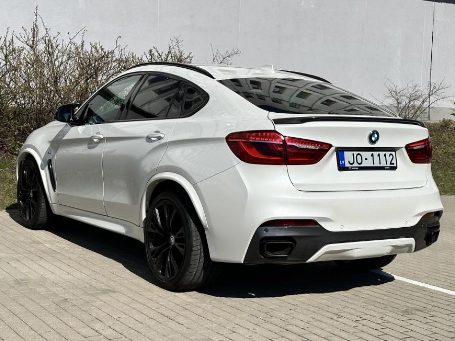 White BMW X6 2015 in Riga, with an engine capacity of 3.00 L and mileage of 185 thousand km for 24900 €, photo 9 on AUTOMOTO.COM.LV