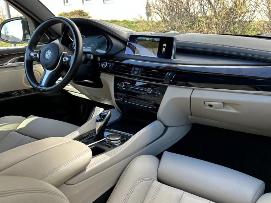 White BMW X6 2015 in Riga, with an engine capacity of 3.00 L and mileage of 185 thousand km for 24900 €, photo 12 on AUTOMOTO.COM.LV