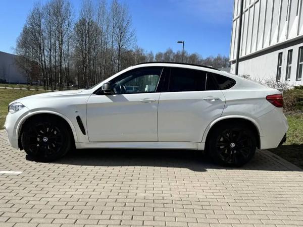 White BMW X6 2015 in Riga, with an engine capacity of 3.00 L and mileage of 185 thousand km for 21900 €, photo 4 on AUTOMOTO.COM.LV