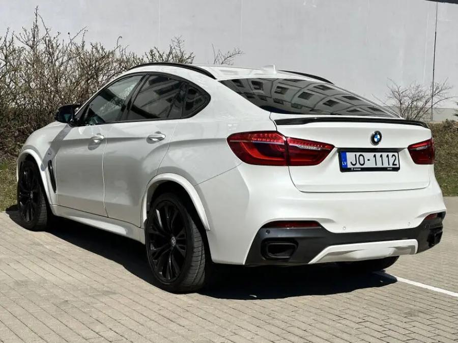 White BMW X6 2015 in Riga, with an engine capacity of 3.00 L and mileage of 185 thousand km for 21900 €, photo 9 on AUTOMOTO.COM.LV