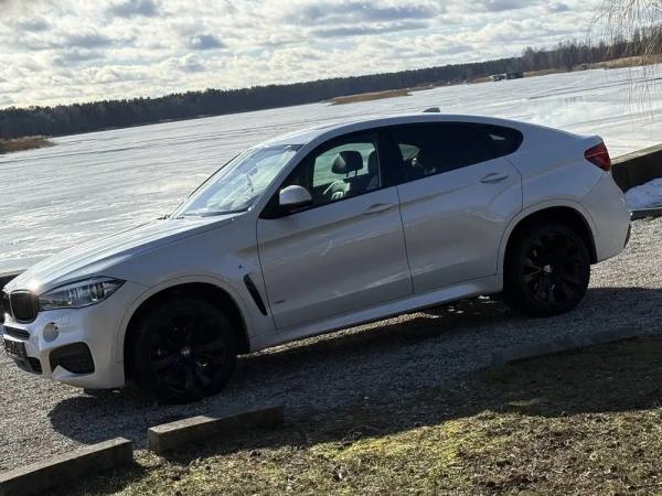 White BMW X6 2015 in Jurmala, with an engine capacity of 3.00 L and mileage of 220 thousand km for 23950 €, photo 8 on AUTOMOTO.COM.LV
