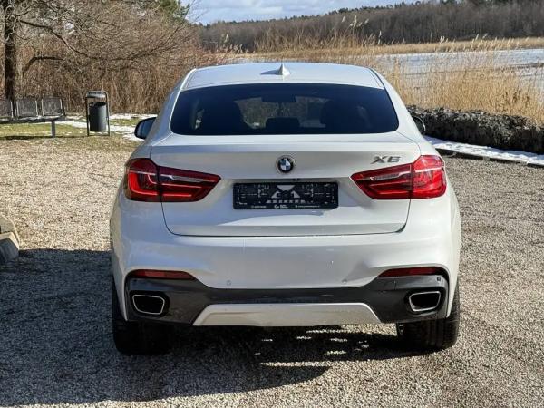 White BMW X6 2015 in Jurmala, with an engine capacity of 3.00 L and mileage of 220 thousand km for 23950 €, photo 10 on AUTOMOTO.COM.LV