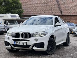 White BMW X6 2015 in Klaipeda, with an engine capacity of 2.99 L and mileage of 230 thousand km for 19999 €, photo  on AUTOMOTO.COM.LV