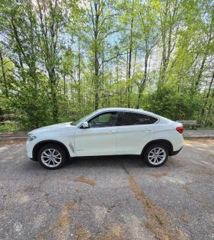 White BMW X6 2015 in Telschi, with an engine capacity of 2.99 L and mileage of 368 thousand km for 18500 €, photo 14 on AUTOMOTO.COM.LV