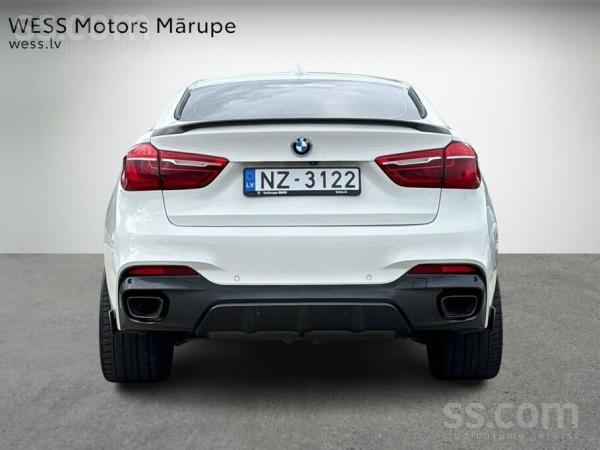 White BMW X6 2016 in Riga, with an engine capacity of 3.00 L and mileage of 156 thousand km for 27590 €, photo 4 on AUTOMOTO.COM.LV