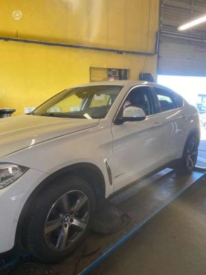 White BMW X6 2016 in Taurage, with an engine capacity of 2.99 L and mileage of 248 thousand km for 13900 €, photo 4 on AUTOMOTO.COM.LV