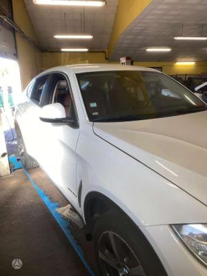 White BMW X6 2016 in Taurage, with an engine capacity of 2.99 L and mileage of 248 thousand km for 13900 €, photo 6 on AUTOMOTO.COM.LV