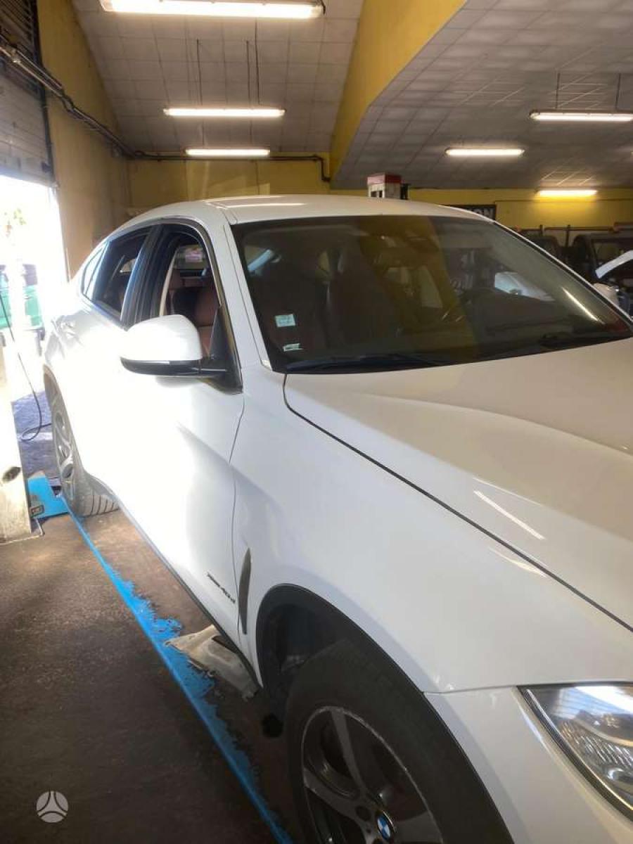 White BMW X6 2016 in Taurage, with an engine capacity of 2.99 L and mileage of 248 thousand km for 13900 €, photo 6 on AUTOMOTO.COM.LV