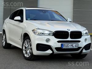White BMW X6 2016 in Riga, with an engine capacity of 3.00 L and mileage of 244 thousand km for 24700 €, photo 4 on AUTOMOTO.COM.LV
