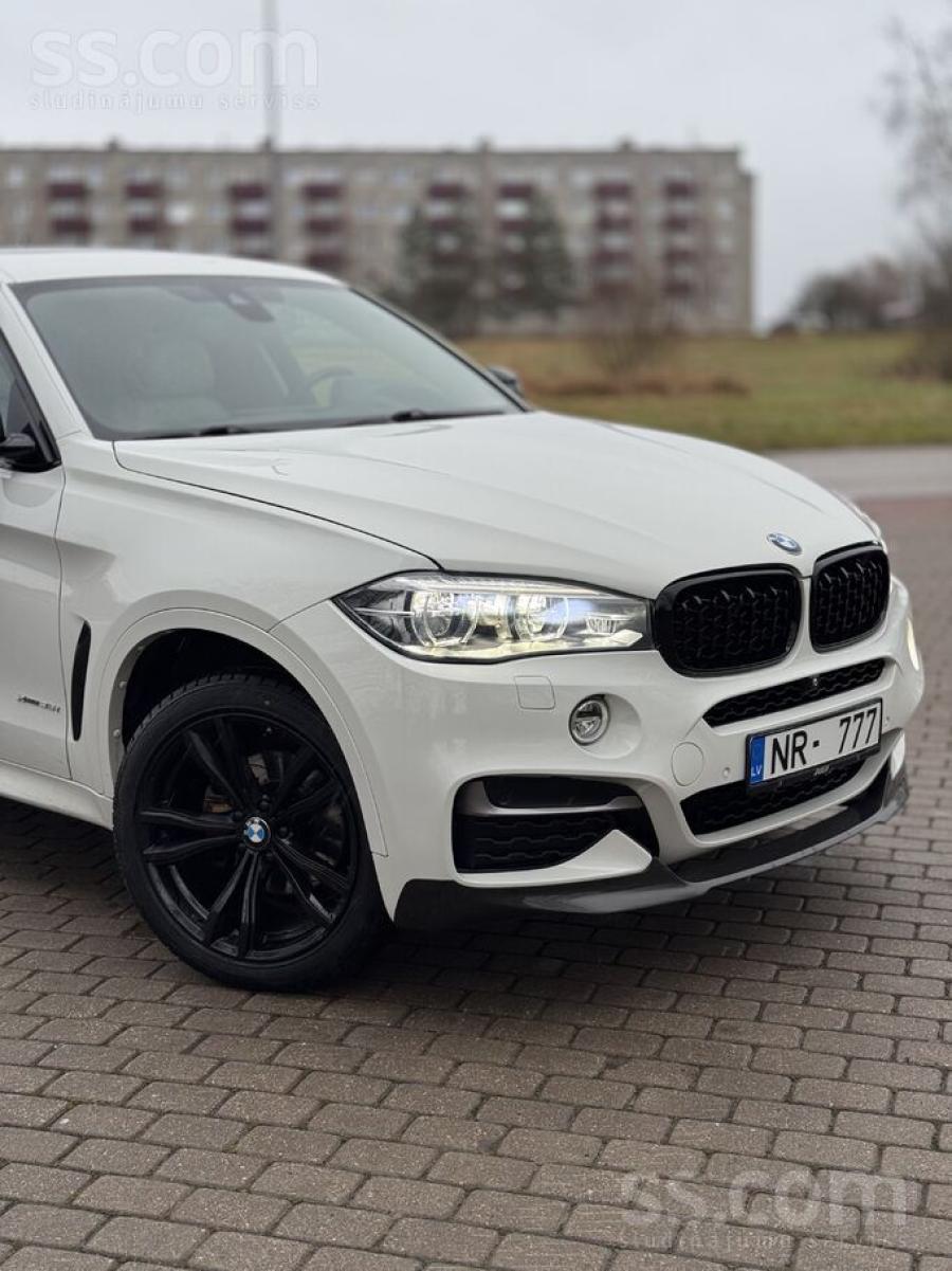White BMW X6 2016 in Riga, with an engine capacity of 3.00 L and mileage of 218 thousand km for 23900 €, photo 1 on AUTOMOTO.COM.LV