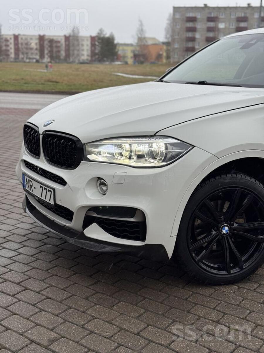 White BMW X6 2016 in Riga, with an engine capacity of 3.00 L and mileage of 218 thousand km for 23900 €, photo 4 on AUTOMOTO.COM.LV