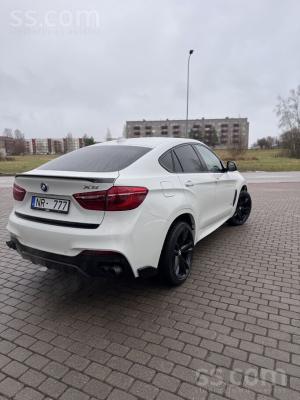 White BMW X6 2016 in Riga, with an engine capacity of 3.00 L and mileage of 218 thousand km for 23900 €, photo 8 on AUTOMOTO.COM.LV