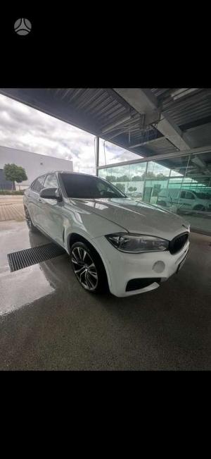 White BMW X6 2016 in Vilnius, with an engine capacity of 4.40 L and mileage of 112 thousand km for 25500 €, photo 6 on AUTOMOTO.COM.LV