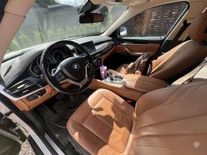 White BMW X6 2016 in Moletai, with an engine capacity of 2.99 L and mileage of 343 thousand km for 19999 €, photo 8 on AUTOMOTO.COM.LV