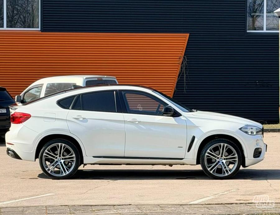 White BMW X6 2016 in Kaunas, with an engine capacity of 3.00 L and mileage of 169 thousand km for 23500 €, photo 8 on AUTOMOTO.COM.LV