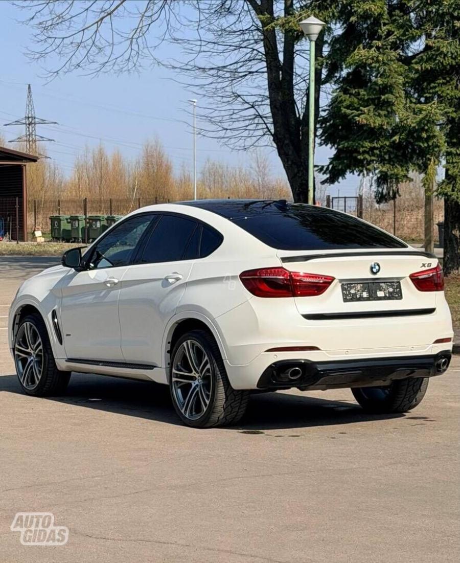 White BMW X6 2016 in Kaunas, with an engine capacity of 3.00 L and mileage of 169 thousand km for 23500 €, photo 9 on AUTOMOTO.COM.LV