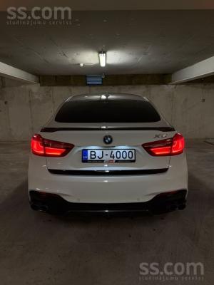 White BMW X6 2016 in Riga, with an engine capacity of 3.00 L and mileage of 225 thousand km for 20999 €, photo 8 on AUTOMOTO.COM.LV