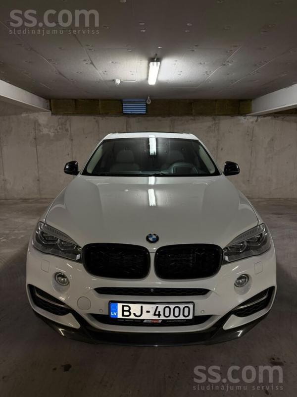 White BMW X6 2016 in Riga, with an engine capacity of 3.00 L and mileage of 225 thousand km for 20999 €, photo 9 on AUTOMOTO.COM.LV