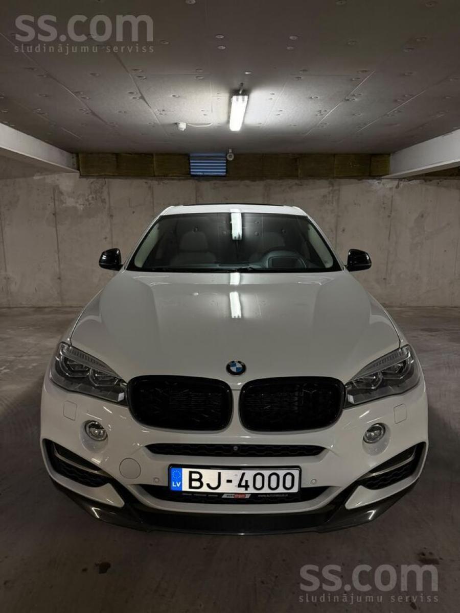 White BMW X6 2016 in Riga, with an engine capacity of 3.00 L and mileage of 225 thousand km for 20999 €, photo 9 on AUTOMOTO.COM.LV