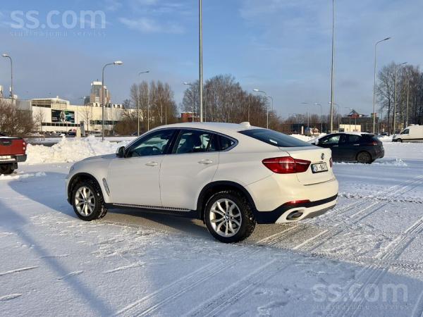 White BMW X6 2017 in Riga, with an engine capacity of 3.00 L and mileage of 0 thousand km for 20880 €, photo 4 on AUTOMOTO.COM.LV