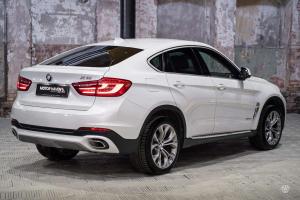 White BMW X6 2017 in Kaunas, with an engine capacity of 3.00 L and mileage of 156 thousand km for 24200 €, photo 5 on AUTOMOTO.COM.LV