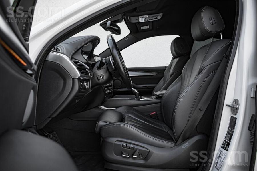 White BMW X6 2017 in Riga, with an engine capacity of 3.00 L and mileage of 150 thousand km for 25990 €, photo 11 on AUTOMOTO.COM.LV