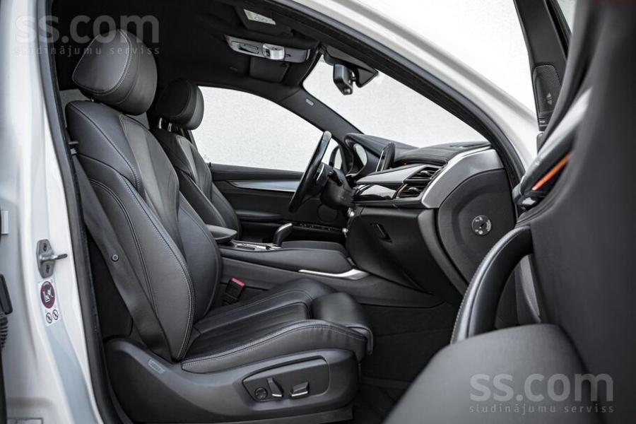 White BMW X6 2017 in Riga, with an engine capacity of 3.00 L and mileage of 150 thousand km for 25990 €, photo 13 on AUTOMOTO.COM.LV