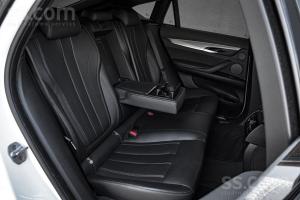 White BMW X6 2017 in Riga, with an engine capacity of 3.00 L and mileage of 150 thousand km for 25990 €, photo 15 on AUTOMOTO.COM.LV