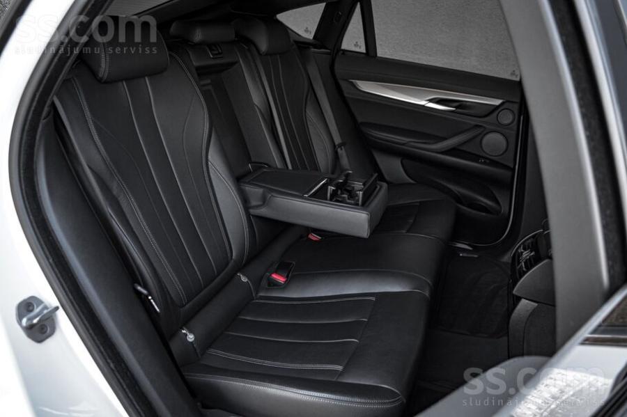 White BMW X6 2017 in Riga, with an engine capacity of 3.00 L and mileage of 150 thousand km for 25990 €, photo 15 on AUTOMOTO.COM.LV