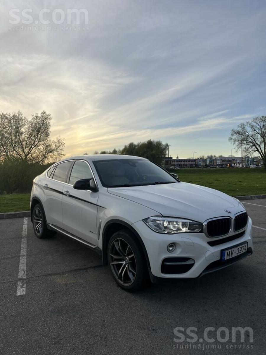 White BMW X6 2017 in Riga, with an engine capacity of 3.00 L and mileage of 170 thousand km for 25900 €, photo 1 on AUTOMOTO.COM.LV