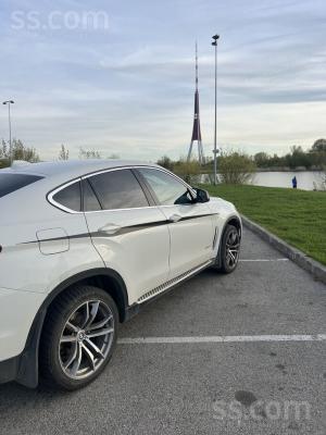 White BMW X6 2017 in Riga, with an engine capacity of 3.00 L and mileage of 170 thousand km for 25900 €, photo 3 on AUTOMOTO.COM.LV