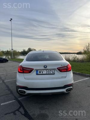 White BMW X6 2017 in Riga, with an engine capacity of 3.00 L and mileage of 170 thousand km for 25900 €, photo 4 on AUTOMOTO.COM.LV