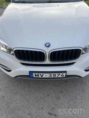 White BMW X6 2017 in Riga, with an engine capacity of 3.00 L and mileage of 170 thousand km for 25900 €, photo 5 on AUTOMOTO.COM.LV