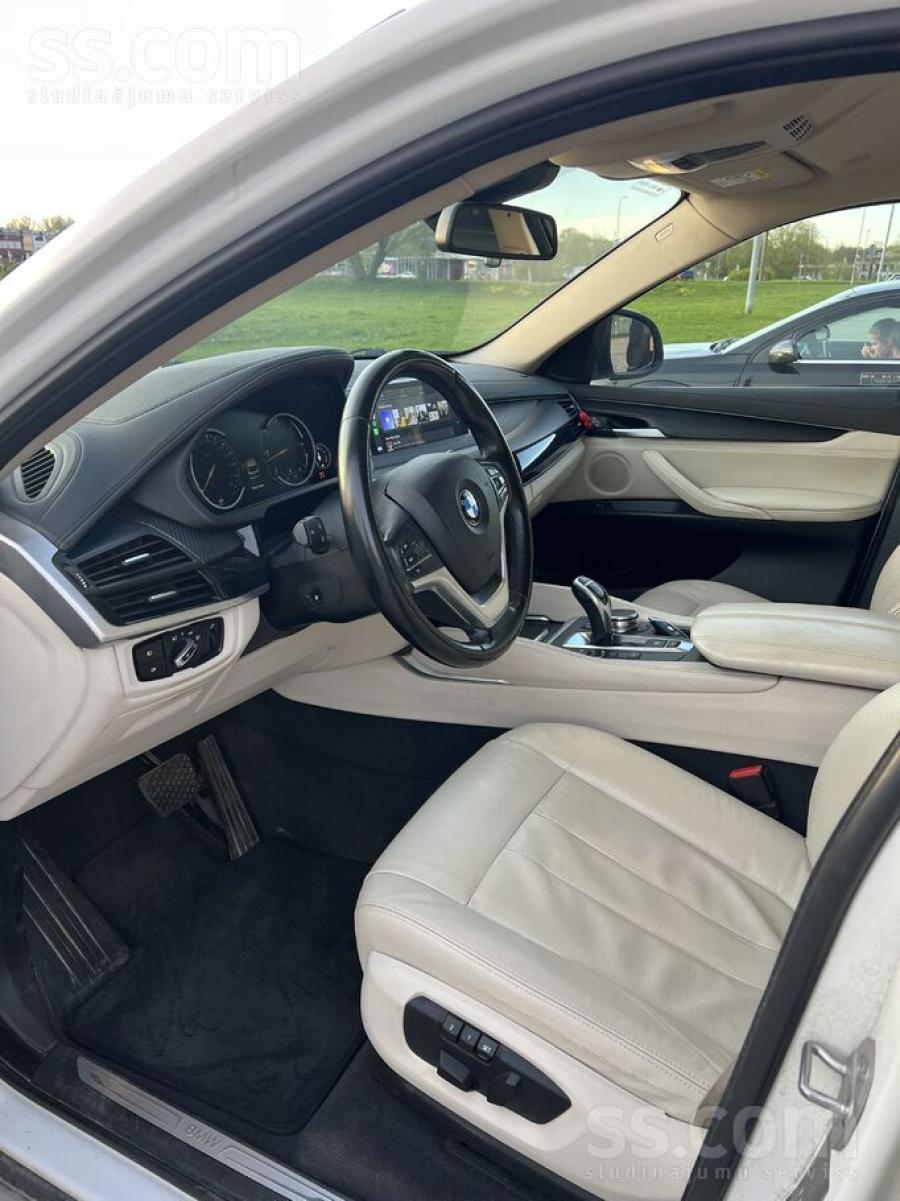 White BMW X6 2017 in Riga, with an engine capacity of 3.00 L and mileage of 170 thousand km for 25900 €, photo 6 on AUTOMOTO.COM.LV