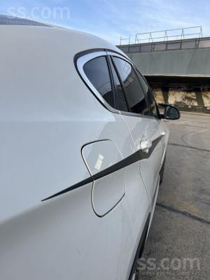 White BMW X6 2017 in Riga, with an engine capacity of 3.00 L and mileage of 170 thousand km for 25900 €, photo 13 on AUTOMOTO.COM.LV