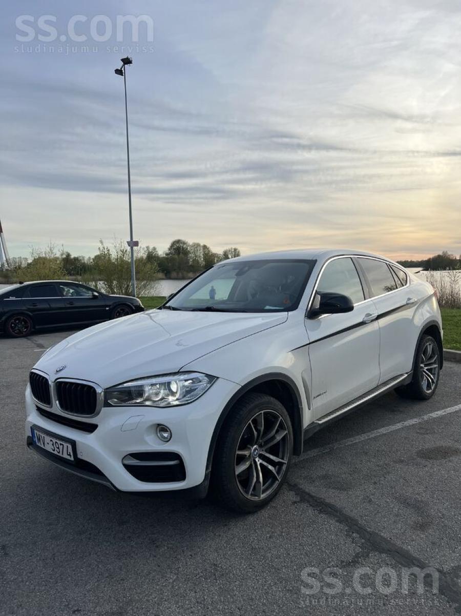 White BMW X6 2017 in Riga, with an engine capacity of 3.00 L and mileage of 170 thousand km for 25900 €, photo 14 on AUTOMOTO.COM.LV