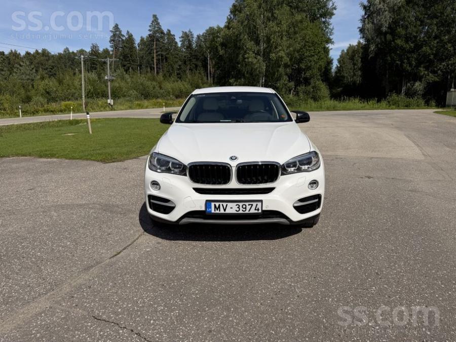 White BMW X6 2017 in Riga, with an engine capacity of 3.00 L and mileage of 180 thousand km for 23500 €, photo 4 on AUTOMOTO.COM.LV