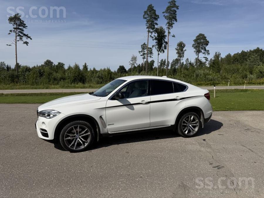 White BMW X6 2017 in Riga, with an engine capacity of 3.00 L and mileage of 180 thousand km for 23500 €, photo 6 on AUTOMOTO.COM.LV