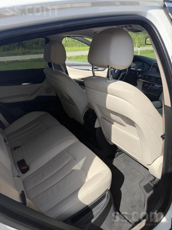 White BMW X6 2017 in Riga, with an engine capacity of 3.00 L and mileage of 180 thousand km for 23500 €, photo 7 on AUTOMOTO.COM.LV