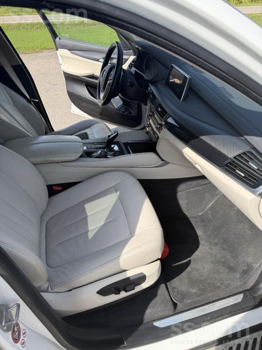 White BMW X6 2017 in Riga, with an engine capacity of 3.00 L and mileage of 180 thousand km for 23500 €, photo 9 on AUTOMOTO.COM.LV