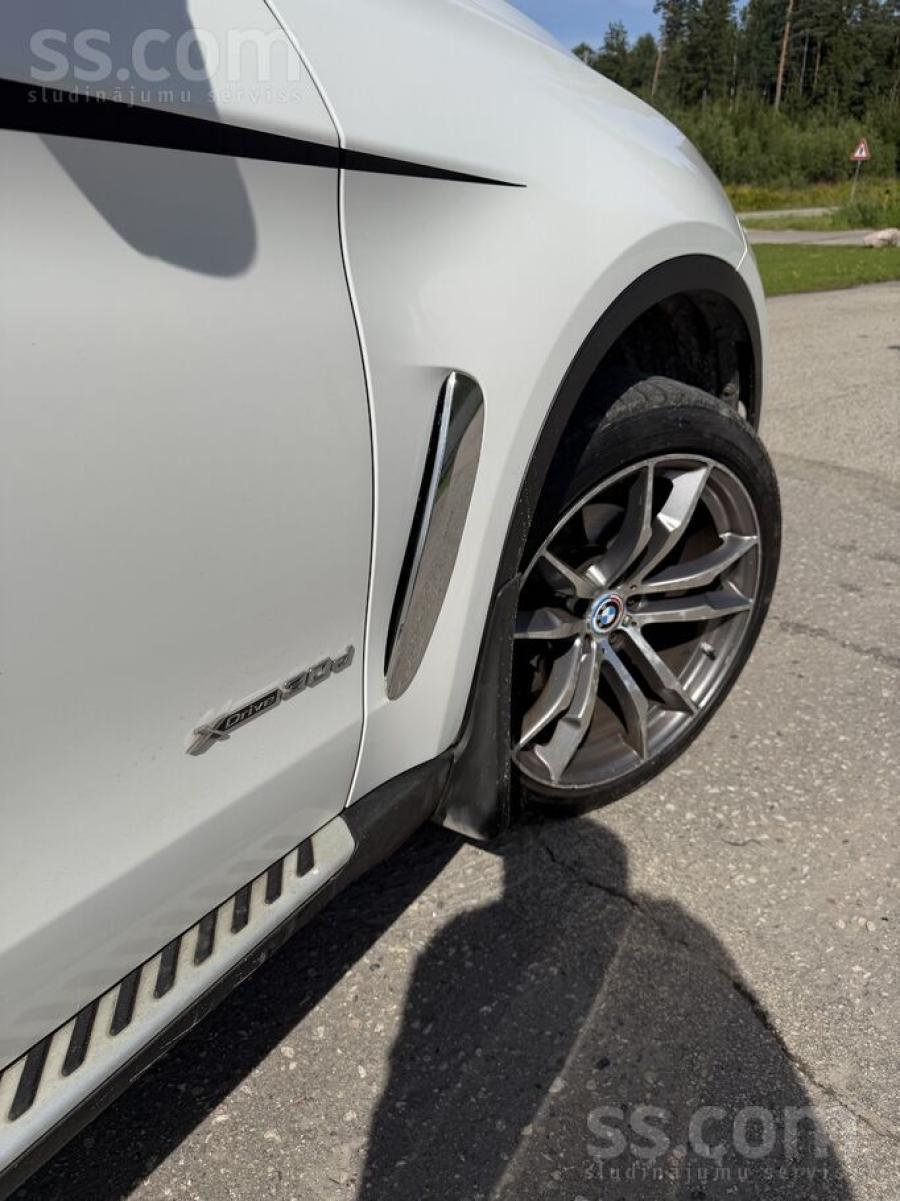 White BMW X6 2017 in Riga, with an engine capacity of 3.00 L and mileage of 180 thousand km for 23500 €, photo 13 on AUTOMOTO.COM.LV