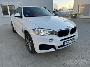 White BMW X6 2018 in Riga, with an engine capacity of 3.00 L and mileage of 0 thousand km for 38800 €, photo 4 on AUTOMOTO.COM.LV